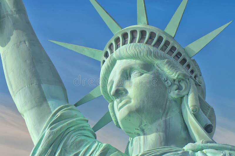 Statue of Liberty Close Up in Blue Cloudy Background Stock Image ...