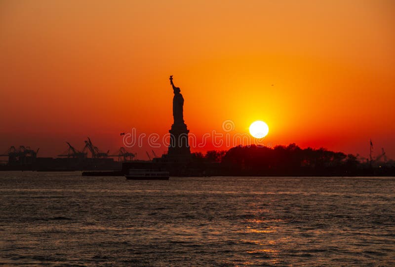 Statue of Liberty on the Liberty Island in the Gathering Dusk Stock ...
