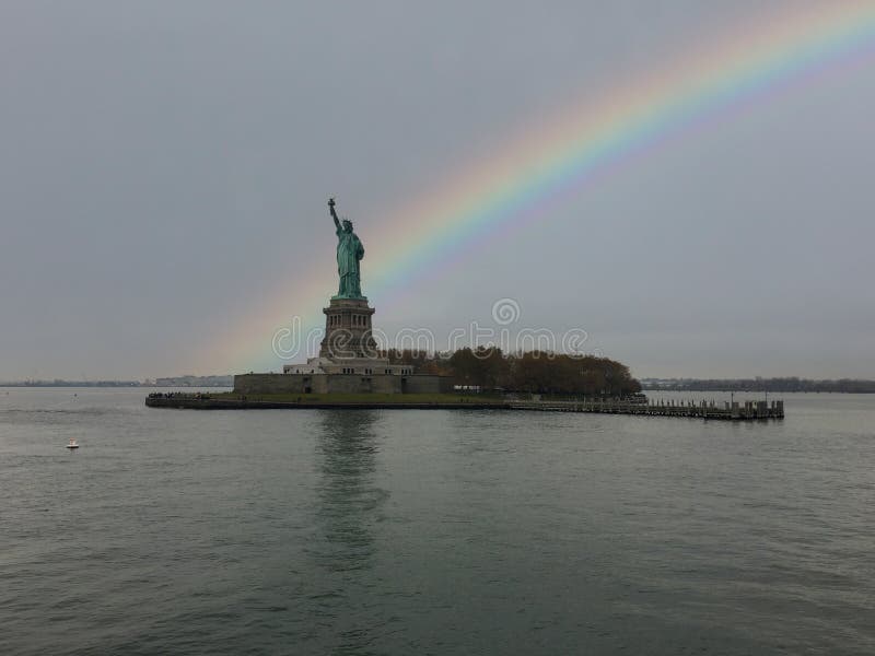 Statue of Liberty with Rainbow in the Background Stock Image - Image of ...