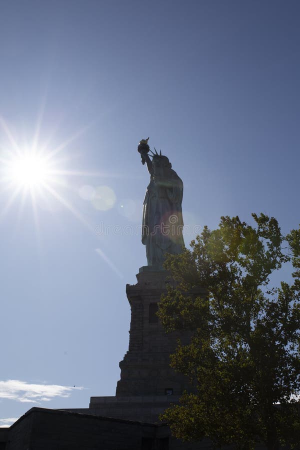 Statue of Liberty in the Sun Stock Image - Image of liberty, side ...