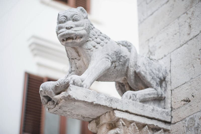 Statue of a Lion on the Wall of an Old Building. Stock Image - Image of ...