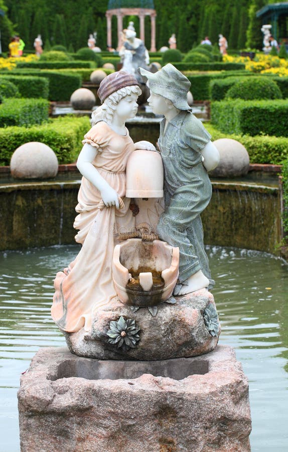 Statue of Lovely Boy and Girl in the Public Garden Stock Photo - Image ...