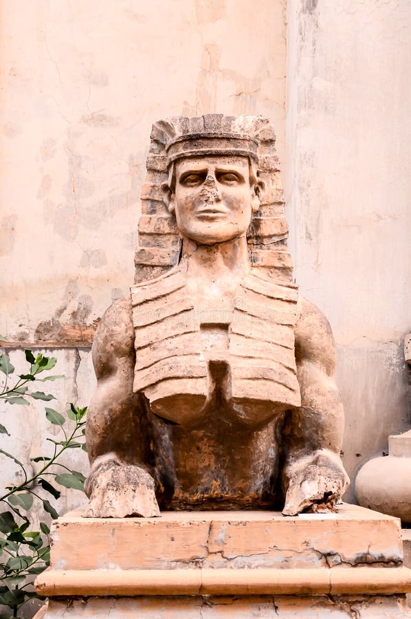 A Statue of a Man with a Long Beard and a Long Neck Stock Photo - Image ...