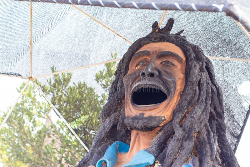 Statue of a Man with Long Dreadlocks Stock Image - Image of mascot ...