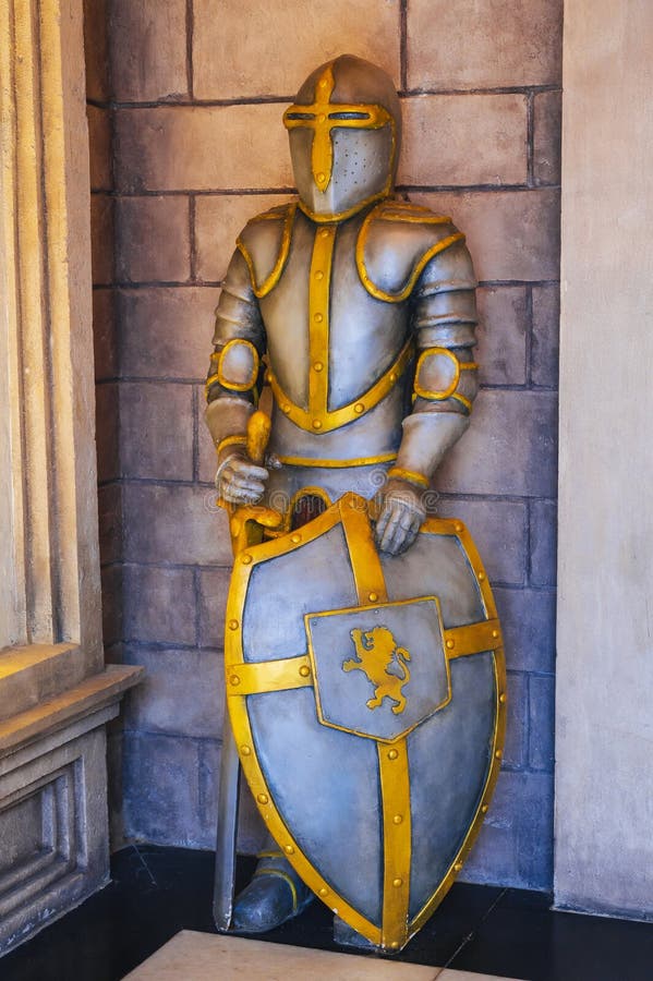 Statue of Medieval European Knight in Armor with Sword and Shield in ...