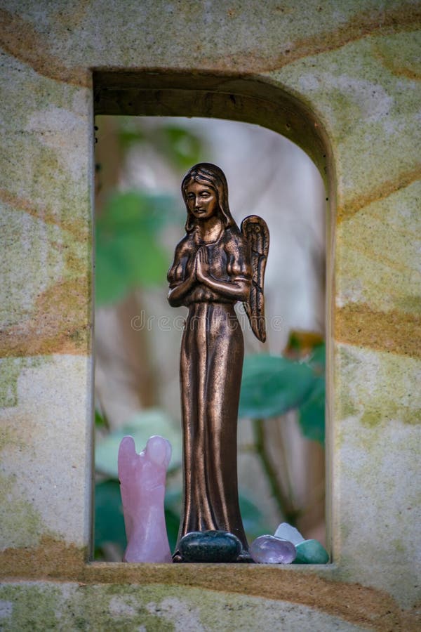 Statue of a mourning angel stock image. Image of mourning - 168984333