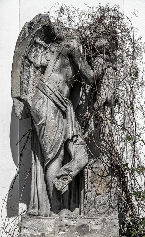 Mourning Angel Sitting on Mausoleum on Cemetery Cimitero Monumentale ...