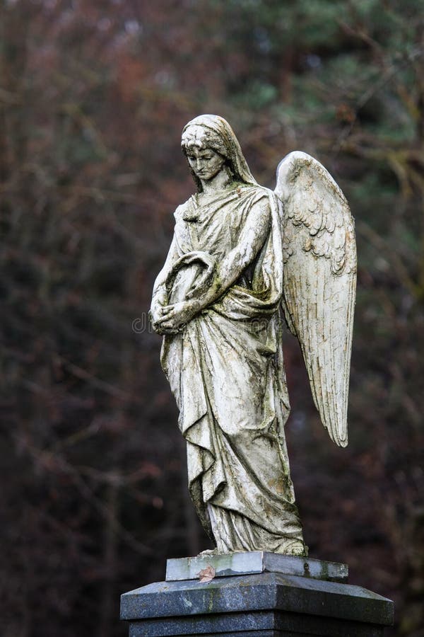 Mourning Angel Sitting on Mausoleum on Cemetery Cimitero Monumentale ...