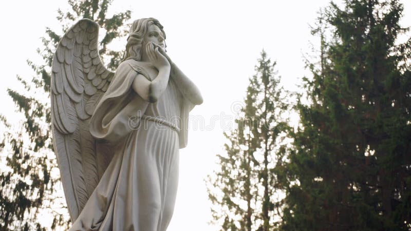 Statue of a pensive angel stock footage. Video of angel - 129311938