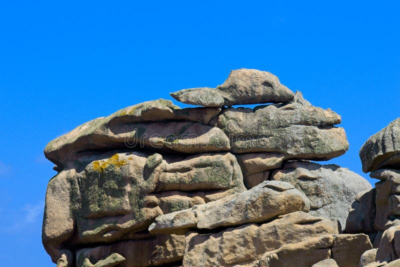 Statue of a Person on a Rock Stock Image - Image of geology, cliff ...