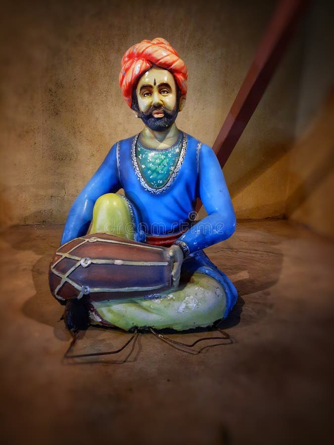 Statue playing dholak stock photo. Image of face, culture - 214891320