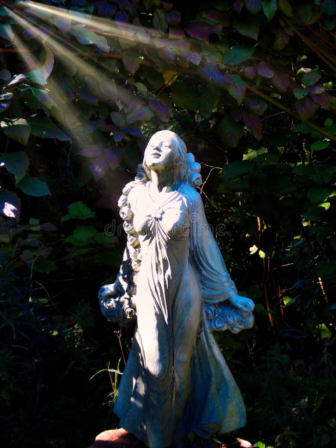 Statue, Rays of Light stock image. Image of temple, blue - 256847153