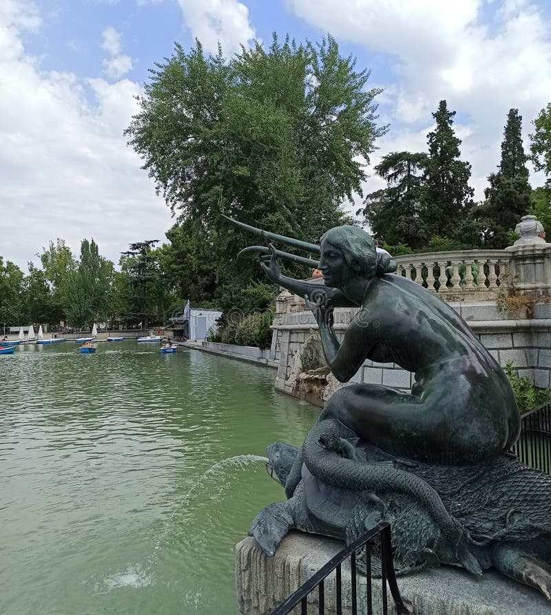 Statue in Retiro Park, Madrid. Editorial Photo - Image of retiro ...