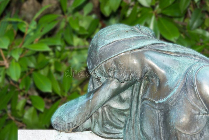 Statue of a sad woman stock image. Image of memorial - 78928797