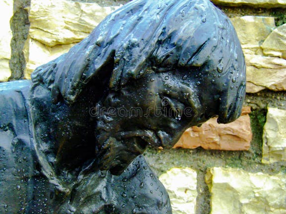 Statue of Saint Joseph Crying in the Rain Stock Photo - Image of tears ...