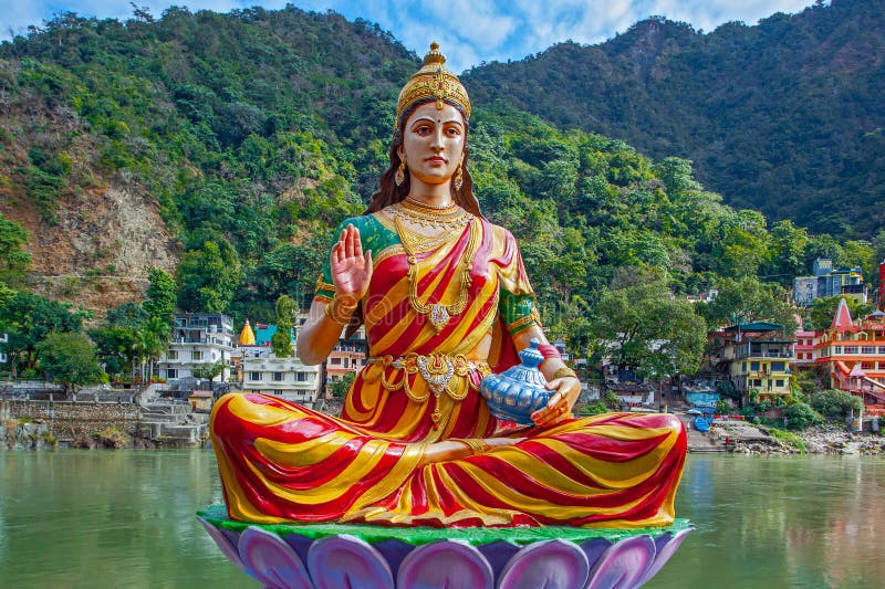 Statue of Sitting Goddess Parvati on the Riverbank of the Ganges River ...