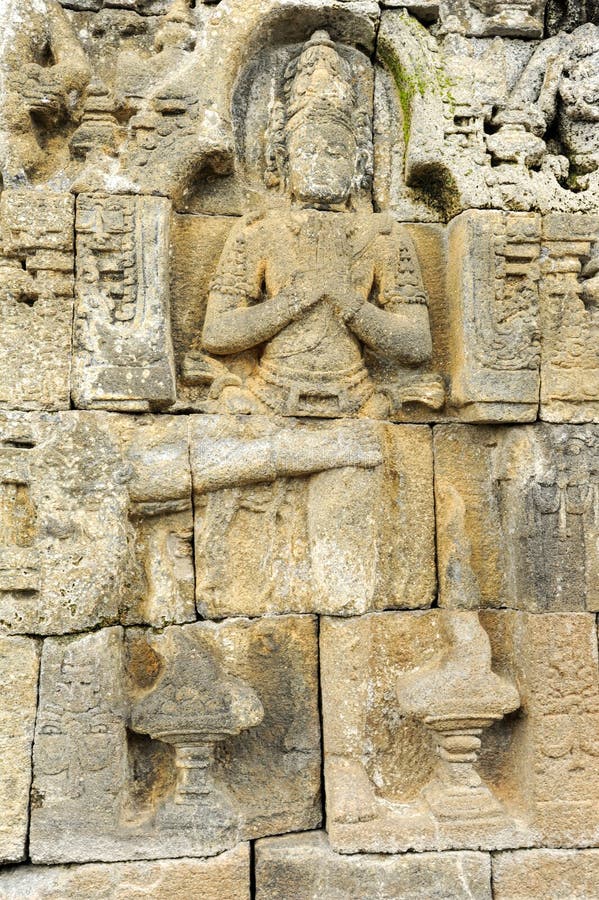 Statue at the Temple of Borobudur on Java Stock Image - Image of ...