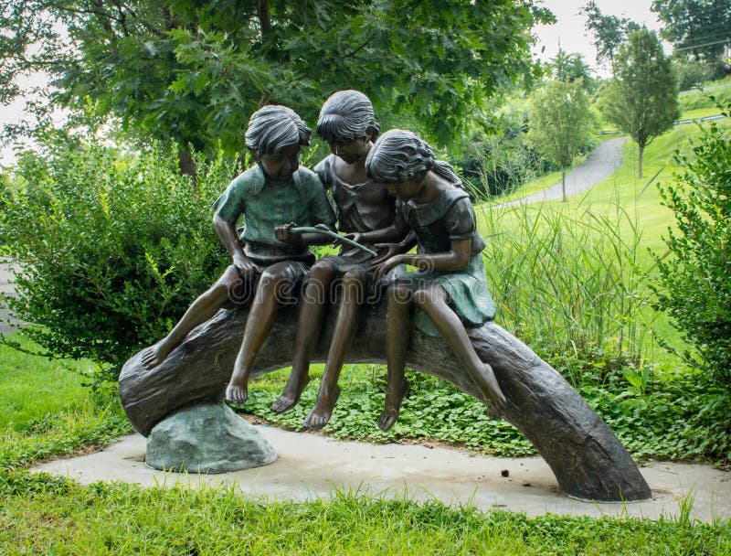 Children on a Log stock photo. Image of kids, bronze - 101147964