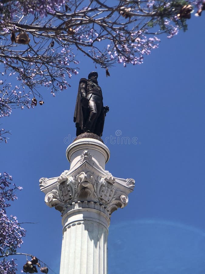Statue in the trees stock photo. Image of flowers, statue - 119899916