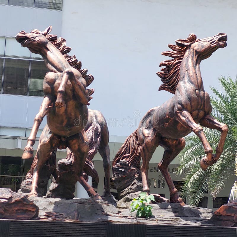 Statue of Two Horses in the Park Stock Image - Image of person, animal ...