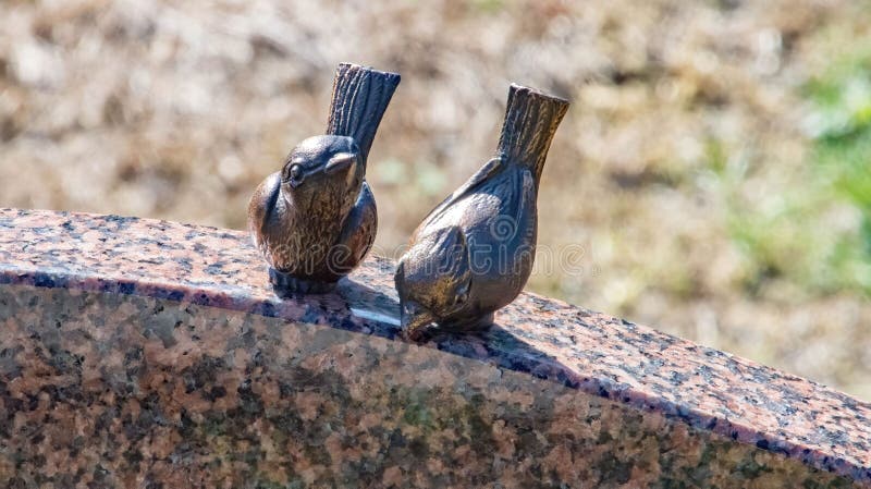 Statue of Two Small Birds Standing on Stone Stock Image - Image of ...