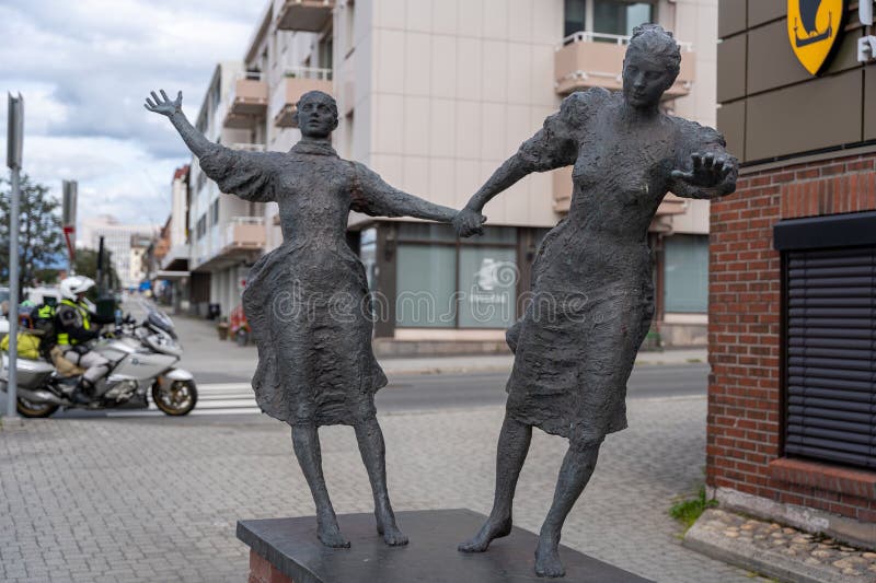 Statue of Two Women Holding Each Other by Hands in Narvik, Norway ...