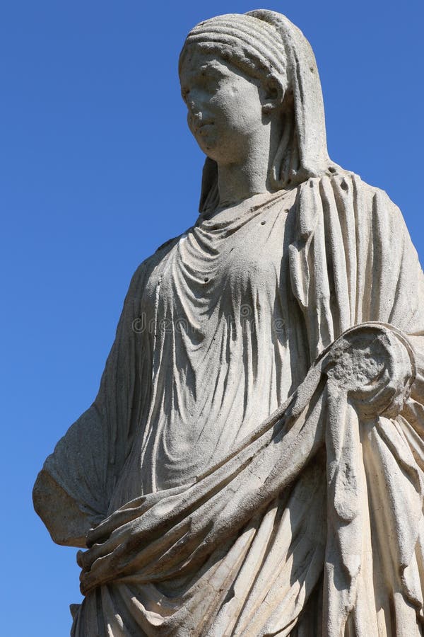Statue of a Vestal Virgin at the Roman Forum Against Blue Sky Stock ...