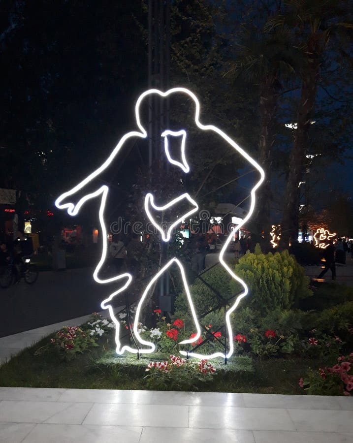 Statue Which is a Glowing of a Man and a Woman Kissing Stock Image ...