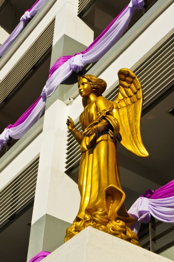 Statue of a winged woman stock photo. Image of catholic - 28290014