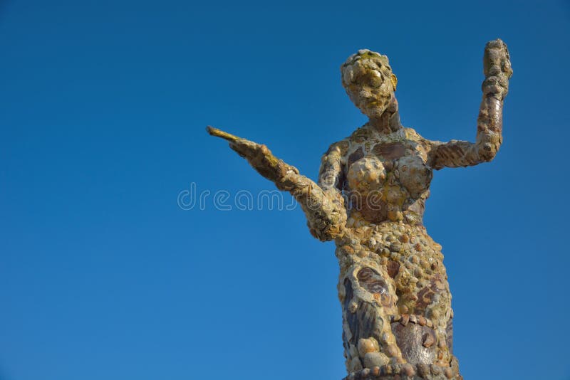 Statue of a Red Woman Sitting on a Pontoon Stock Image - Image of ...