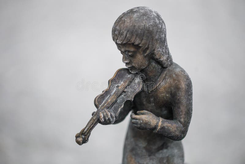 Statues of Children Playing Musical Instruments Stock Image - Image of ...