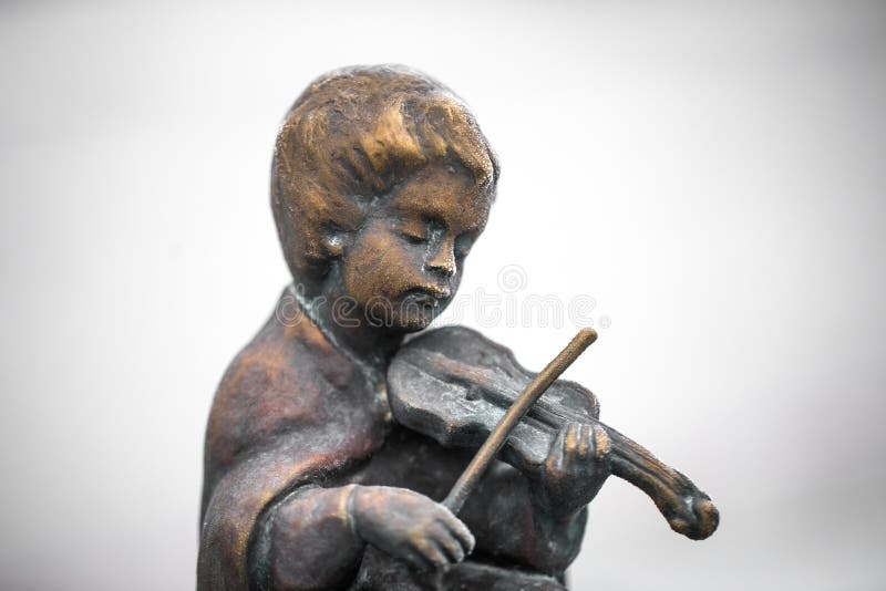 Statues of Children Playing Musical Instruments Stock Image - Image of ...