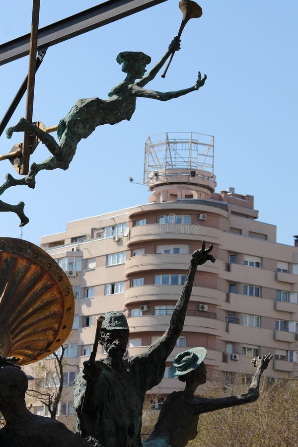 Statues in Front of a Modern Building Editorial Photography - Image of ...