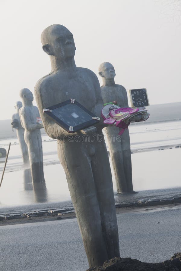 Statues in Lapindo mud. editorial image. Image of landscape - 209609930