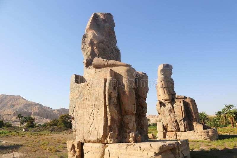 Statues of Memnon stock photo. Image of adult, hierogliphs - 117685374