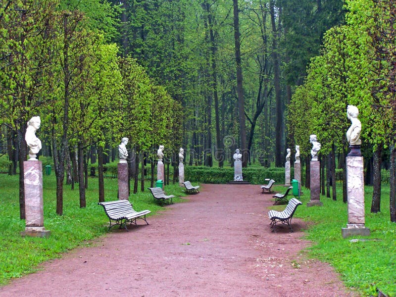 Statues in the Park stock photo. Image of trees, benches - 88591012