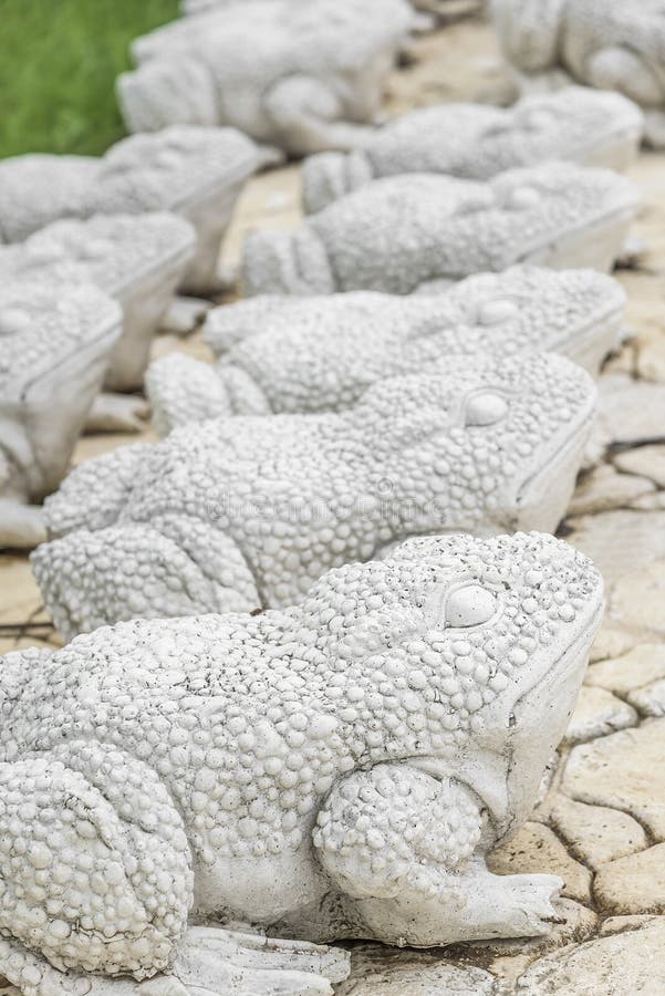 Statues of stone frogs. stock photo. Image of outdoor - 73784742