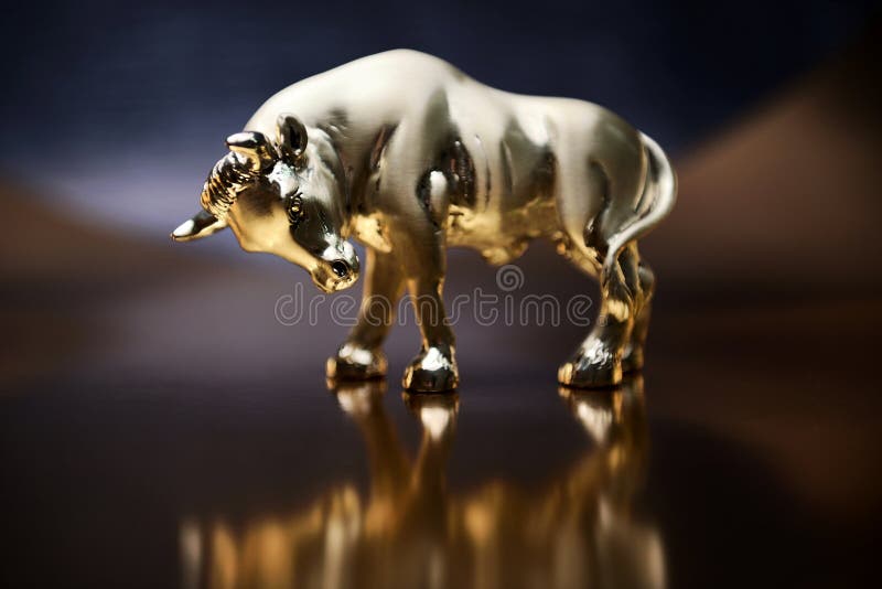 Statuette of a Bull on an Abstract Background with Reflection. Stock ...