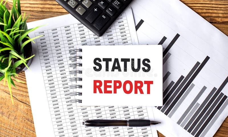STATUS REPORT Text on a Notebook with Chart and Calculator Stock Photo ...