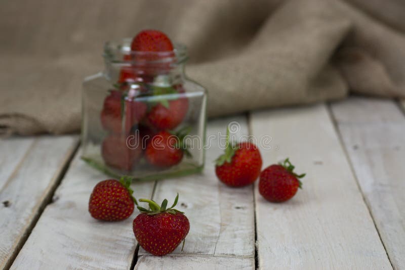 Stawberries in a Jar and Spilt on Table Stock Photo - Image of healthy ...