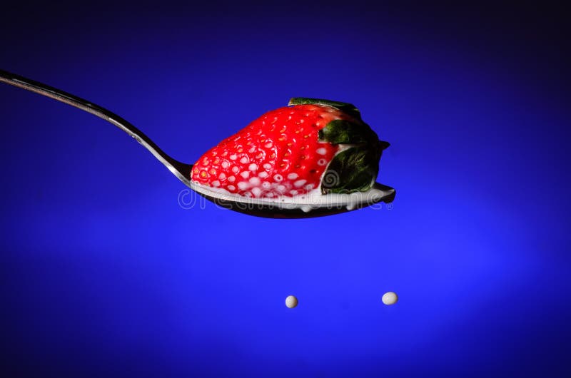 Stawberry Dropping in a Spoon Stock Image - Image of crown, abstract ...