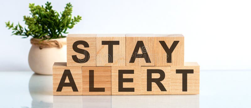 Stay Alert Word Written on Wood Block. Faqs Text on Table, Concept ...