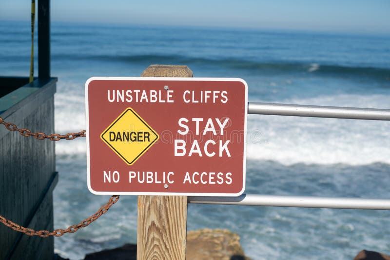 Stay back sign on a beach stock photo. Image of water - 304004990