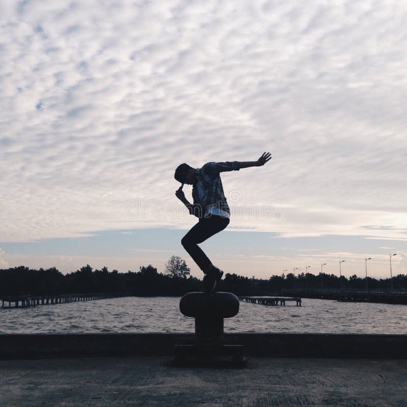 Stay in Balance. Young Sportive Mixed Race Woman in Sportswear Lifting ...