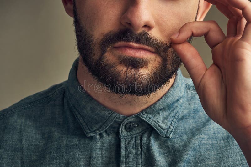 Stay Bearded, Stay Cool. a Young Man Twirling His Mustache. Stock Image ...