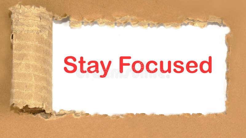 Stay Focused the Inscription Appearing Behind the Torn Cardboard Paper ...
