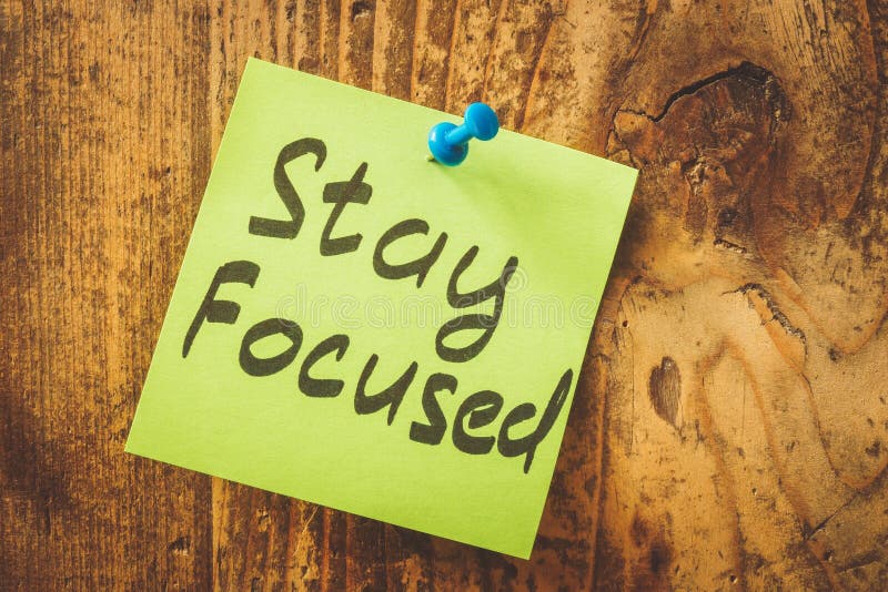 Stay Focused Lettering on Sticker Attached To Board. Stock Photo ...