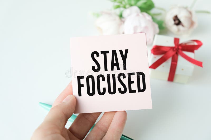 STAY FOCUSED Message on the Card Held by Stock Image - Image of modern ...