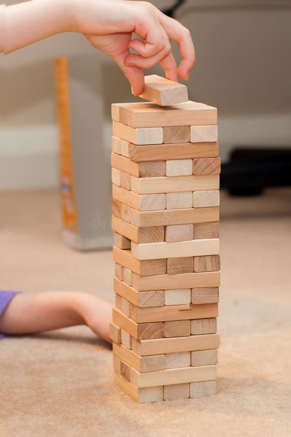 Stay Home Coronavirus Concept. Playing Wooden Block Game Stock Photo ...