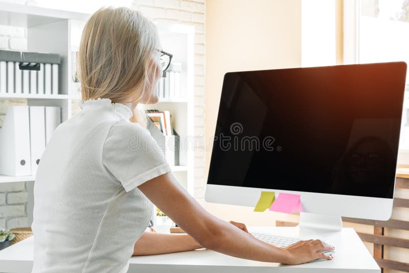Stay Safe and Working from Home. Young Woman Working at Home. Stock ...
